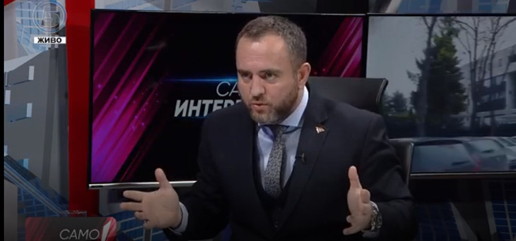 Toshkovski expects photographed applicants to have their passports in a ...